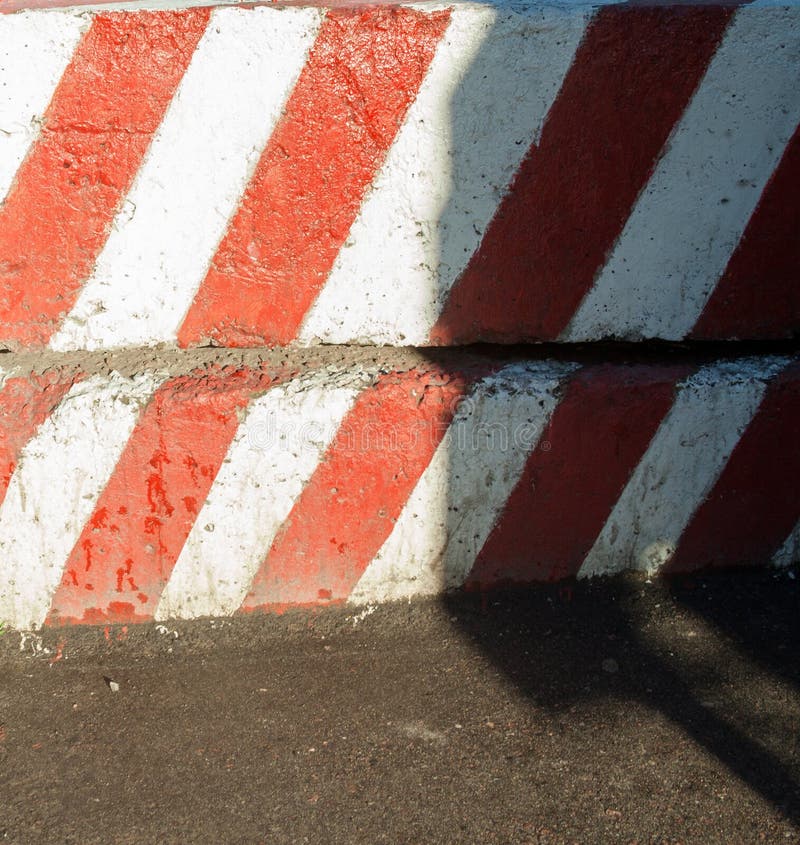Red and White Stripes on the Concrete Block Stock Photo - Image of ...