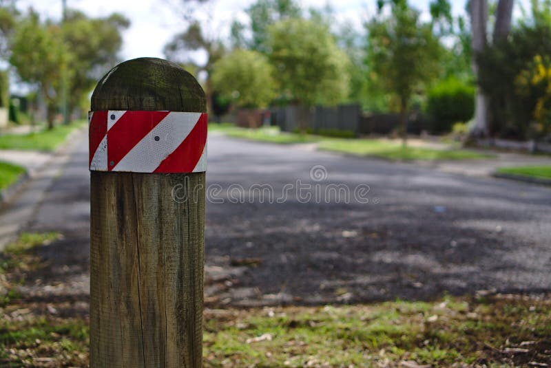 Red and White Stripes Pole on Street Stock Image - Image of obstacle ...
