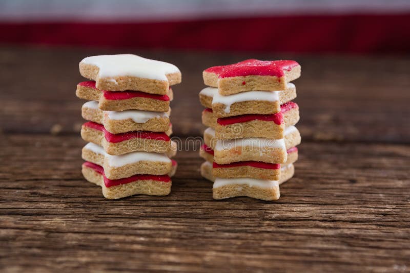 Red and White Sugar Cookies Stacked on Wooden Table Stock Photo - Image ...