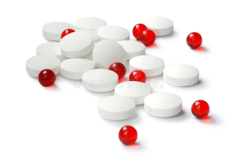 Red and white tablets stock image. Image of pill, cure - 3864947