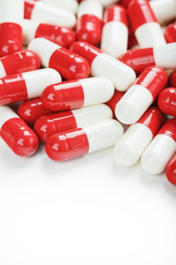 Red and White Tablets on a White Background with Free Space. Stock ...