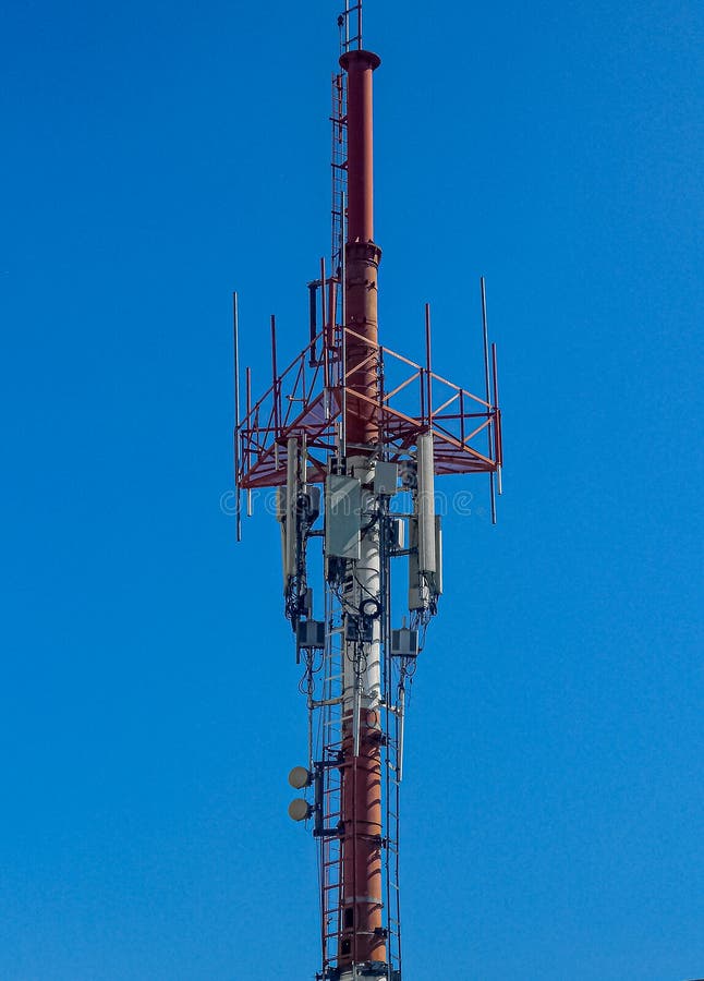 Red and White Telecommunication Mast with Blue Sky Stock Photo - Image ...