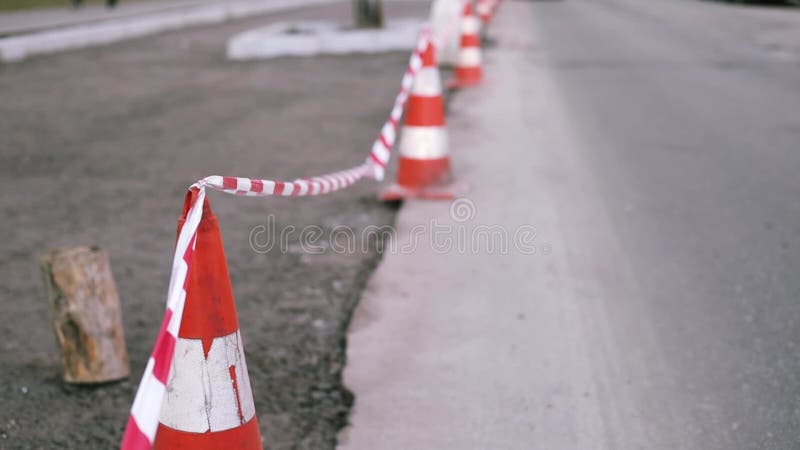 Red-white Tape Encloses the Place of Construction or Repair Work ...