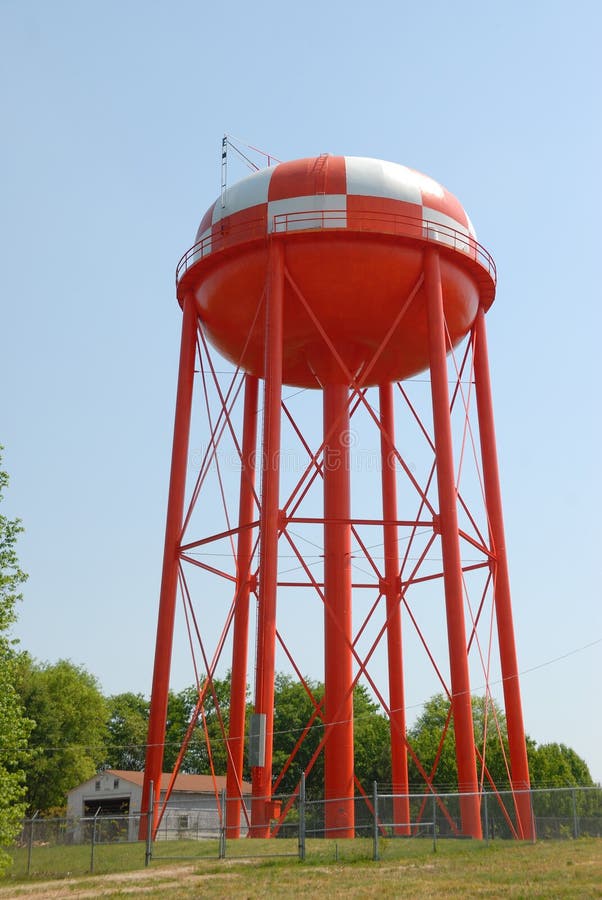 Red and white water tower stock image. Image of storage - 14000971