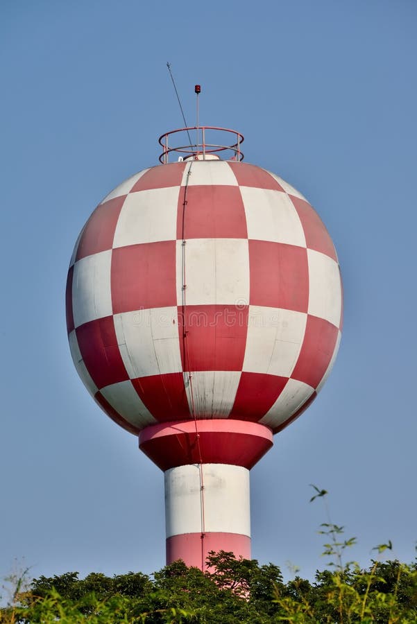 Red and white water tower stock image. Image of store - 14000971