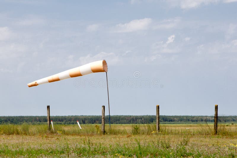 Airfield With An Aircraft And A Windsock Stock Image - Image of ...
