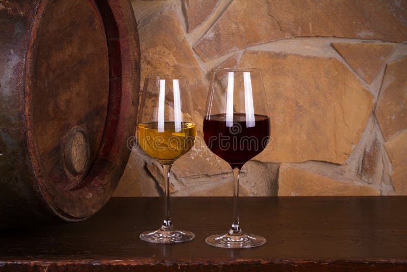 Red and White Wine beside Old Cask in Wine Cellar. Stock Image - Image ...