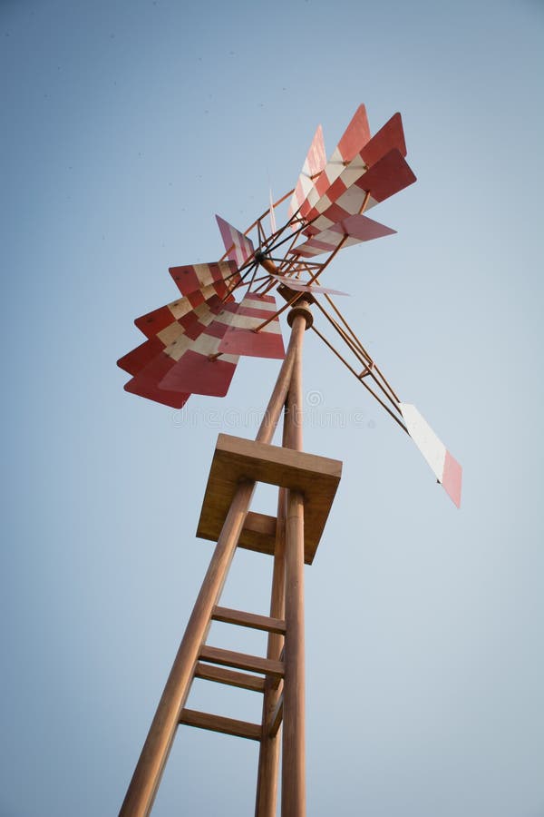 Red wind turbine stock photo. Image of blue, wood, wind - 67575898