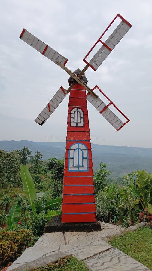 A red windmill stock image. Image of agriculture, colorful - 218989229