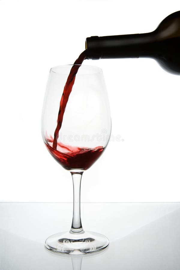 Pouring red wine stock image. Image of motion, studio - 13382913