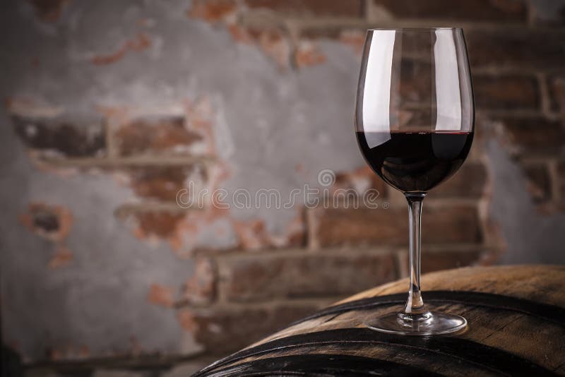 Red wine on a barrel stock photo. Image of wall, barrel - 116599840