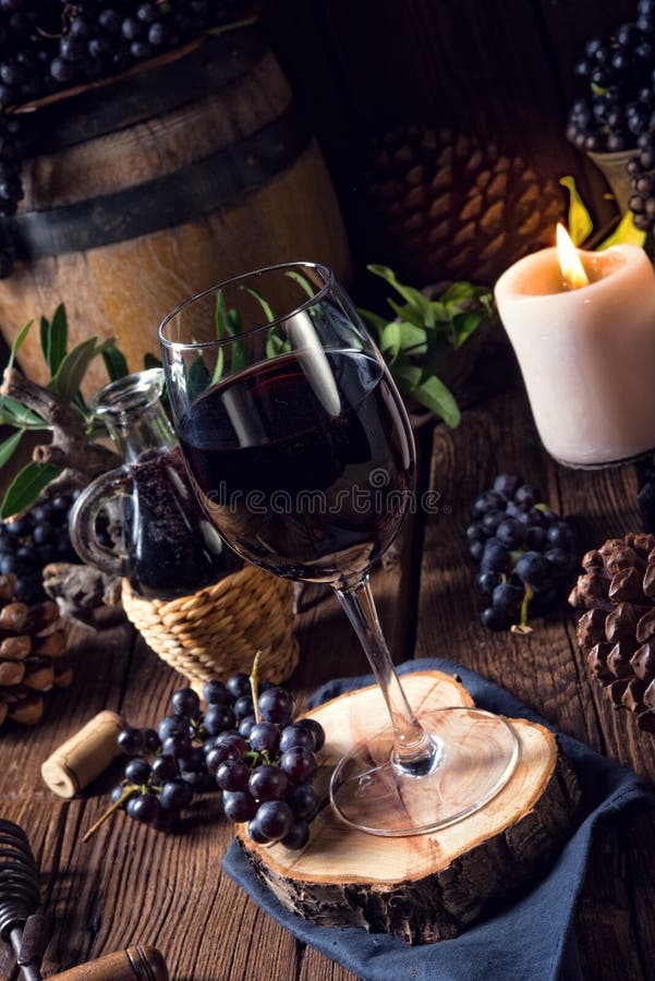 Red Wine from a Barrel with Grapes and a Glass of Wine Stock Image ...