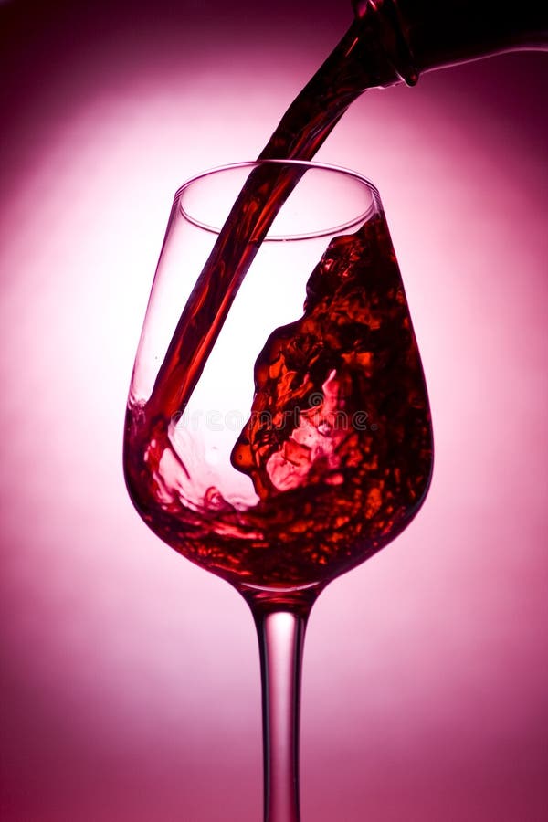 Red wine being poured stock image. Image of white, drink - 7481255