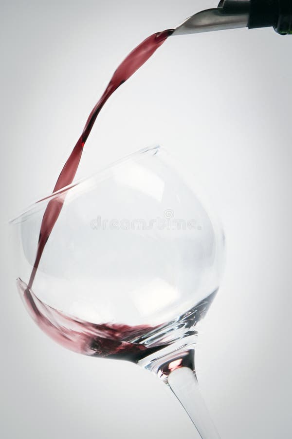 Red wine being poured stock photo. Image of vinous, alcohol - 34848622
