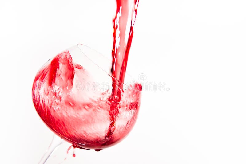 Red Wine Falling in a Way Splashing into a Wine Glass Stock Photo ...