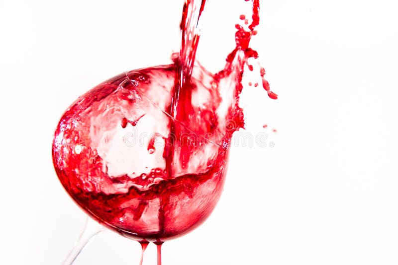 Red Wine Falling in a Way Splashing into a Wine Glass Stock Photo ...