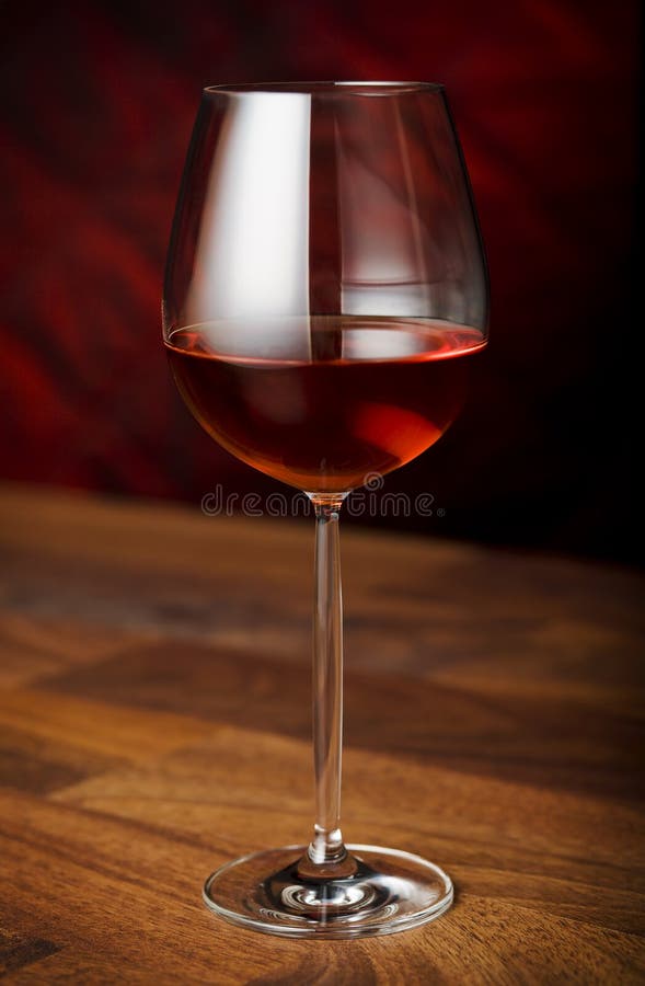 A Glass of Red Wine on an Old Rustic Table Stock Image - Image of ...