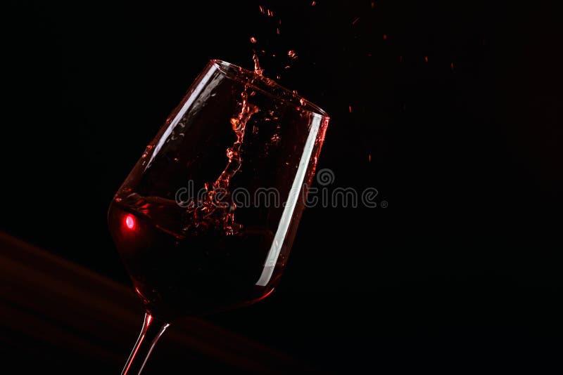 Red Wine Glass Splash on Black Background Stock Image - Image of ...