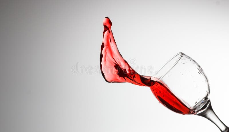 Red Wine Splash from Glass on Bokeh Background Stock Photo - Image of beverage, white: 132855548