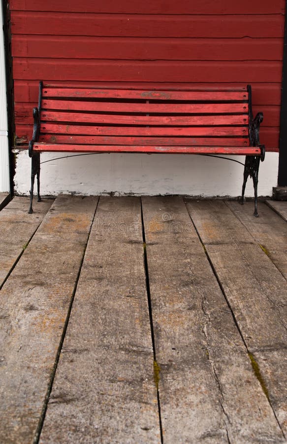 Red wooden bench stock photo. Image of aged, wall, bench - 16265268