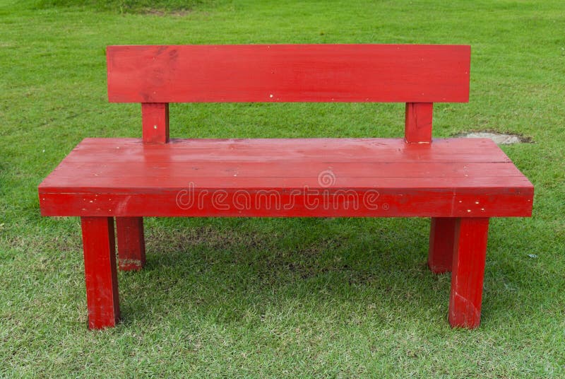 Red Wooden Bench on the Green Grass Stock Photo - Image of decorative ...
