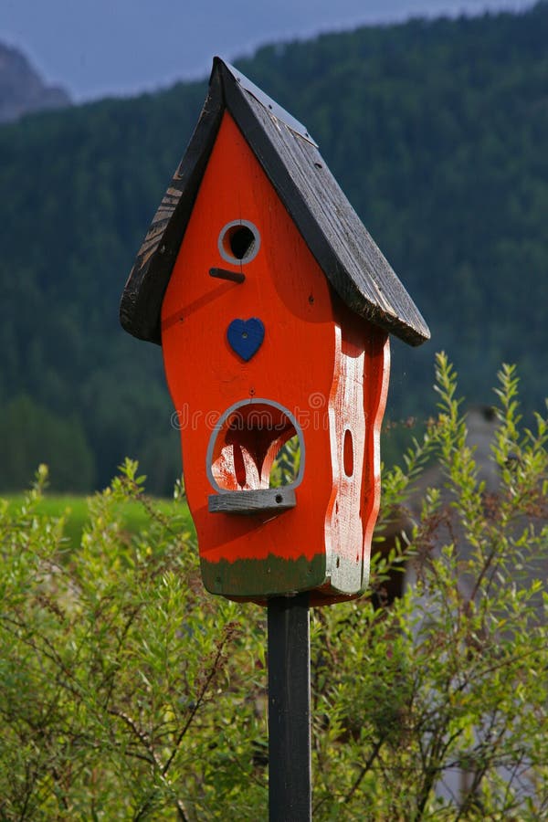 Red Wooden birdhouse stock photo. Image of live, dolomite - 27459922