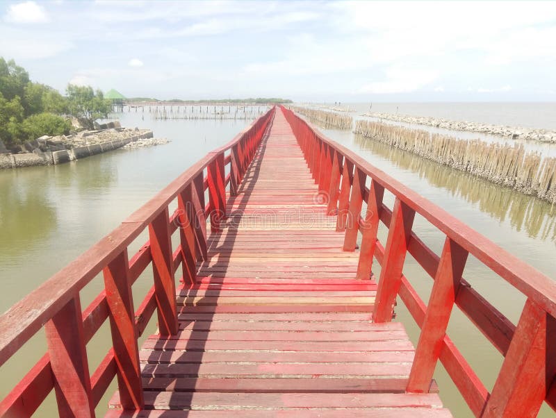 Red Wooden Bridge in Waterfront Stock Photo - Image of pier, trip ...