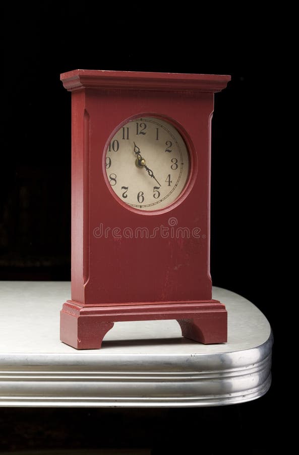 Red Wooden Clock stock photo. Image of black, vertical - 12057624