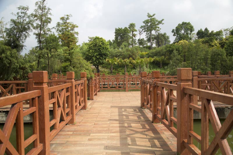 Curved bridge over stream stock photo. Image of architecture - 232245874