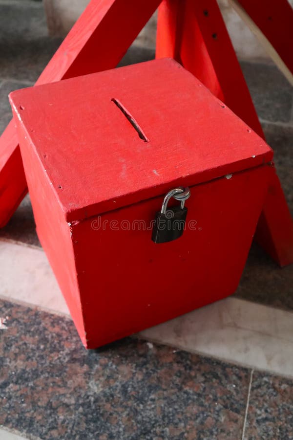 Red wooden donation box stock photo. Image of currency - 245825954