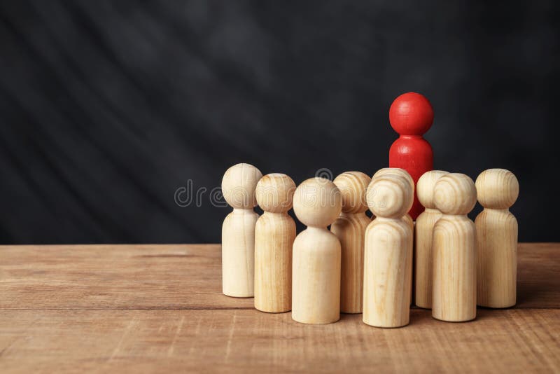 Red Wooden Figures Stand Out from the Crowd of Wooden Figures Stock ... Red Wooden Figures Stand Out from the Crowd of Wooden Figures Stock ...