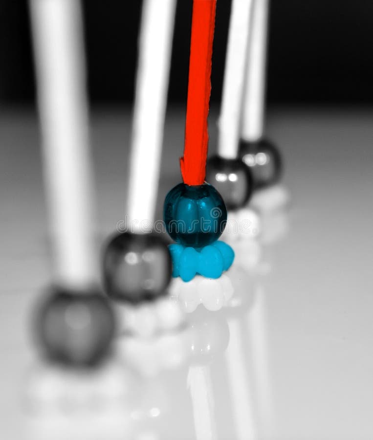 Red Wooden Sticks with Blue Plastic Objects Photo Stock Photo - Image ...