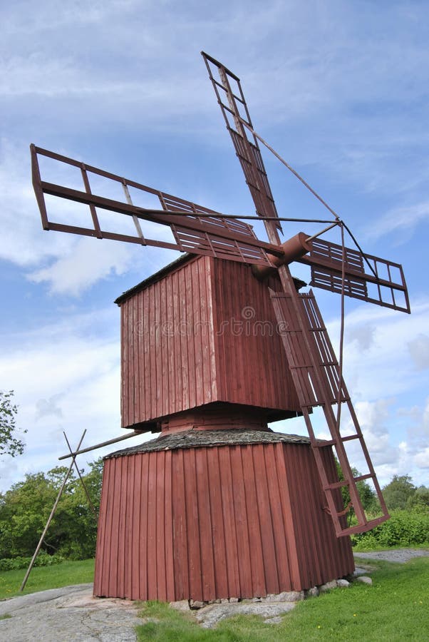 Red Wooden Windmill stock image. Image of white, color - 11839899