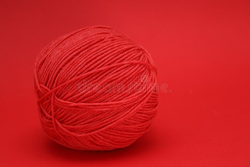 Red Wool Ball on Red Background Stock Image - Image of woven, hobby ...