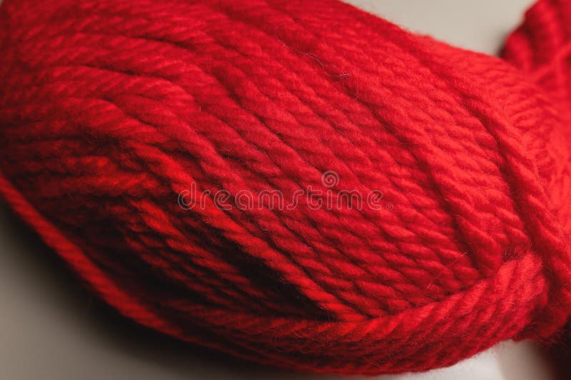 Red Wool Yarn Close-up of an Unknitted Piece of Wool Next To a Ball of ...