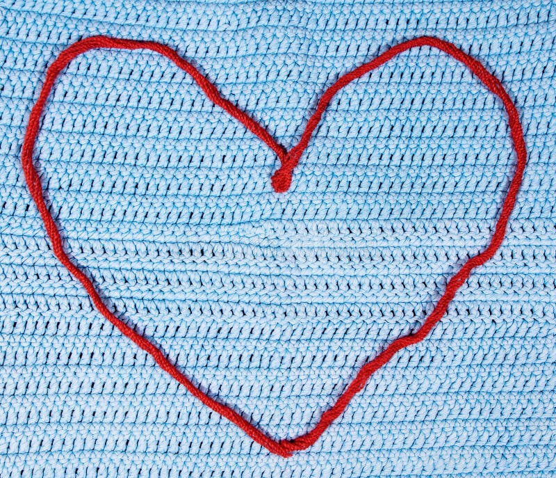 Red Woolen String Heart on Crocheted Cloth Stock Photo - Image of ...