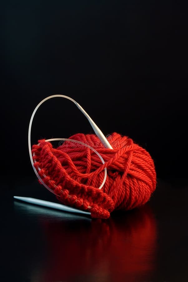 Red yarn ball with needles stock photo. Image of making - 11420064
