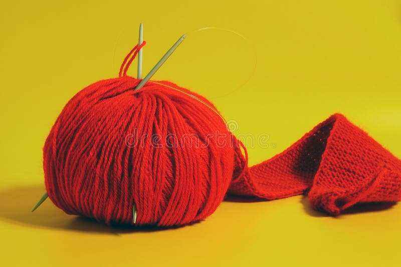 Red Yarn Thread on Yellow Background Stock Photo - Image of composition ...