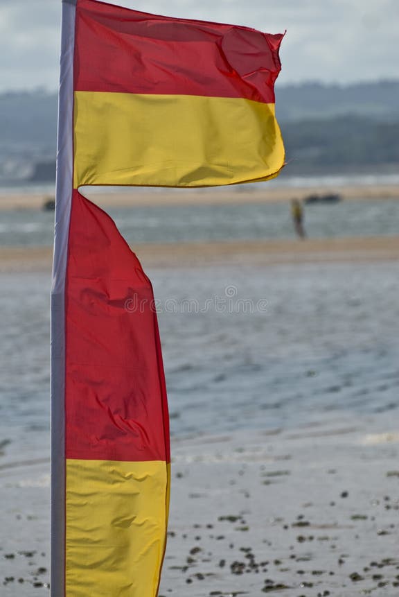 Red & Yellow Bathing Flags Stock Photo - Image of bathing, wind: 11135232
