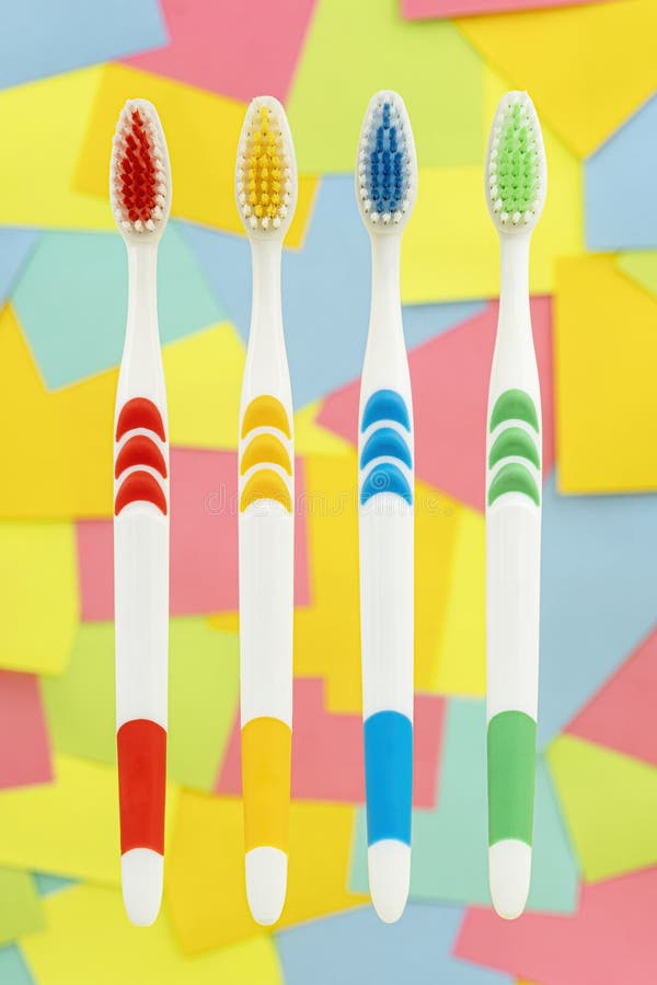 Toothbrushes with Multicolored Paper Sticky Notes on Background Stock ...