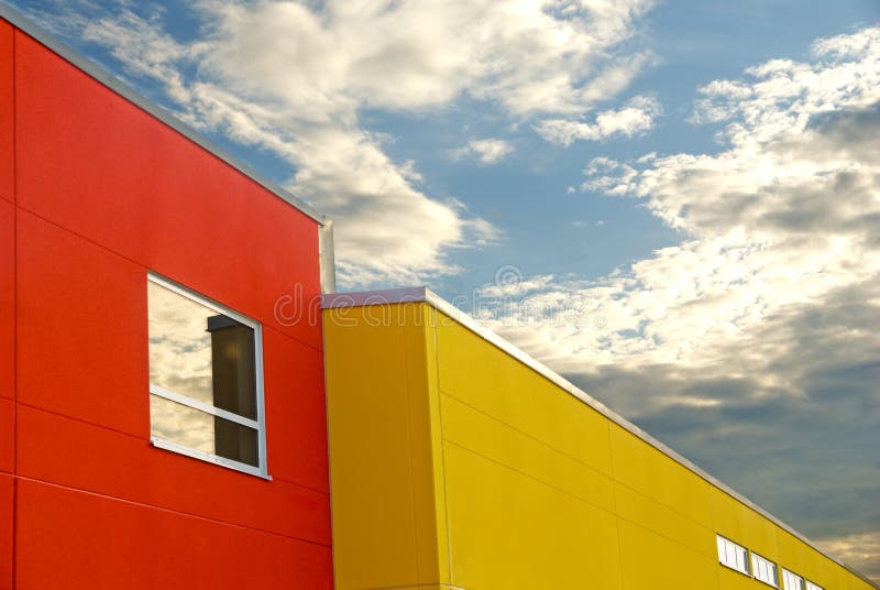 Red and yellow building stock image. Image of industrial - 12421983