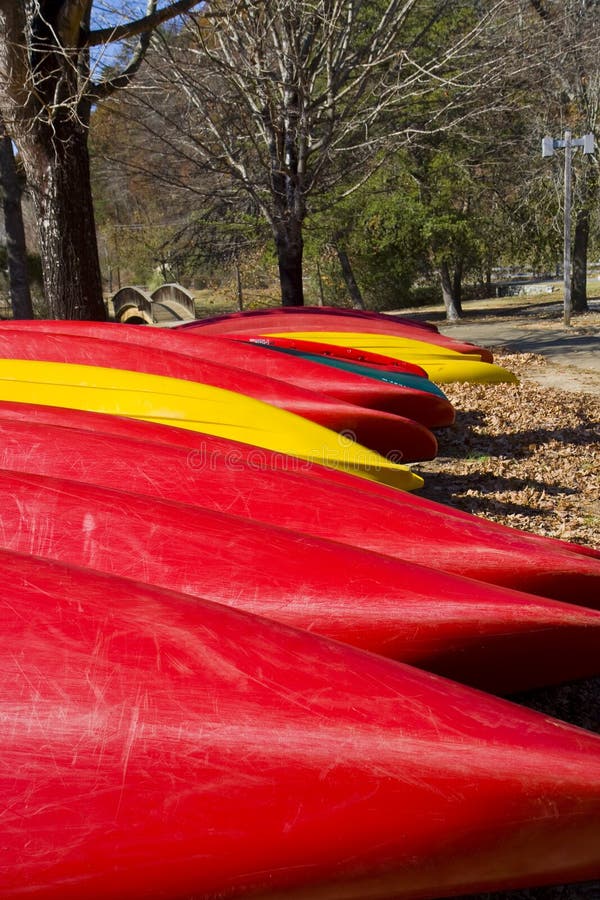 Red and Yellow Canoes Vertical Stock Image - Image of kayak, lake: 7482703