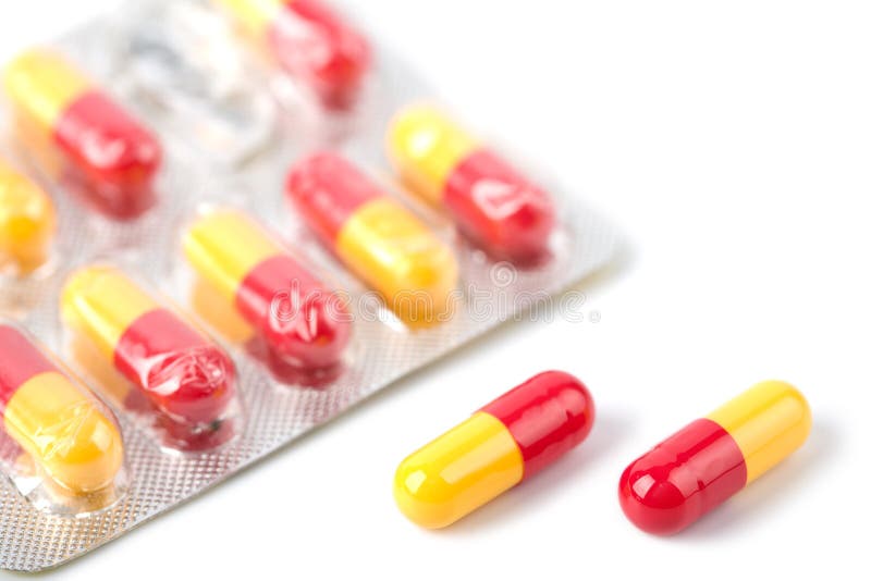 Red and Yellow Capsule Pills in Blister Isolated Stock Image - Image of ...