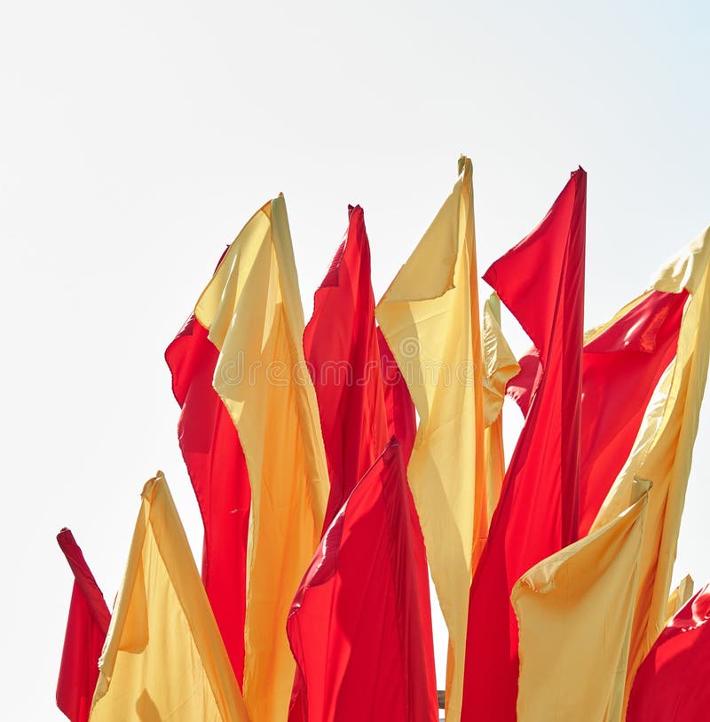 Red and Yellow Celebration Flags Stock Image - Image of wavy ...