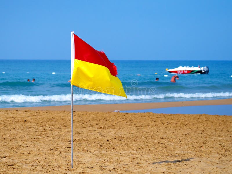 Flag on Beach Marking Safe Swimming Area Stock Image - Image of water ...