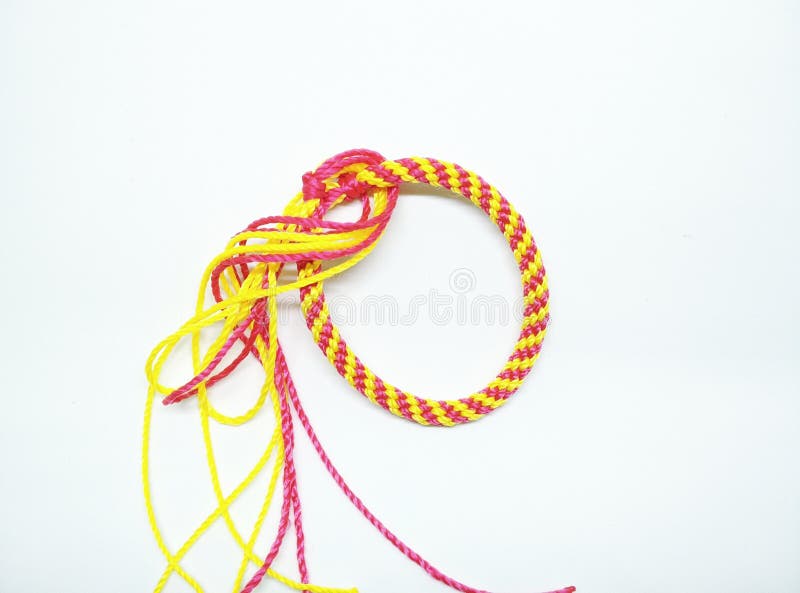 Red Yellow Friendship Bracelet Stock Image - Image of organ, pink ...