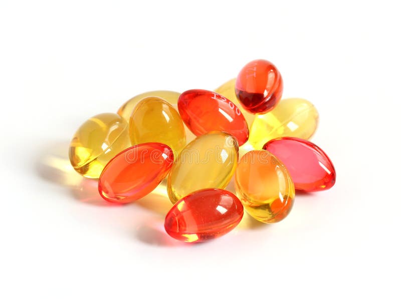 Red and Yellow Gel Capsules Stock Photo - Image of pill, natural: 18223860