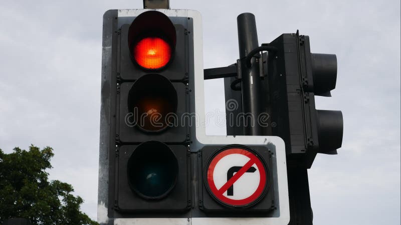 At the Traffic Light, the Green Light Changes To Yellow, Then Red Stock ...