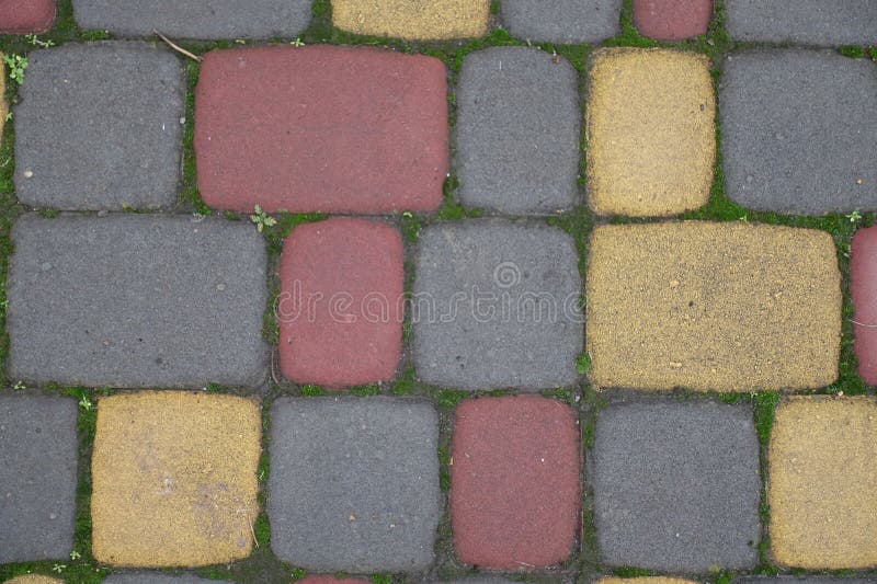 Red, Yellow and Grey Wet Concrete Pavement with Moss in Joints Texture ...