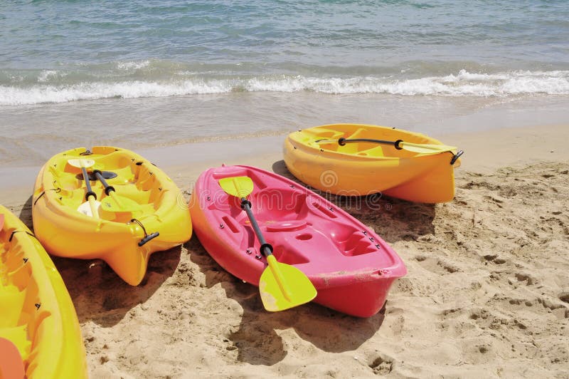 Red and yellow KayakS stock photo. Image of travel, anchor - 8227680